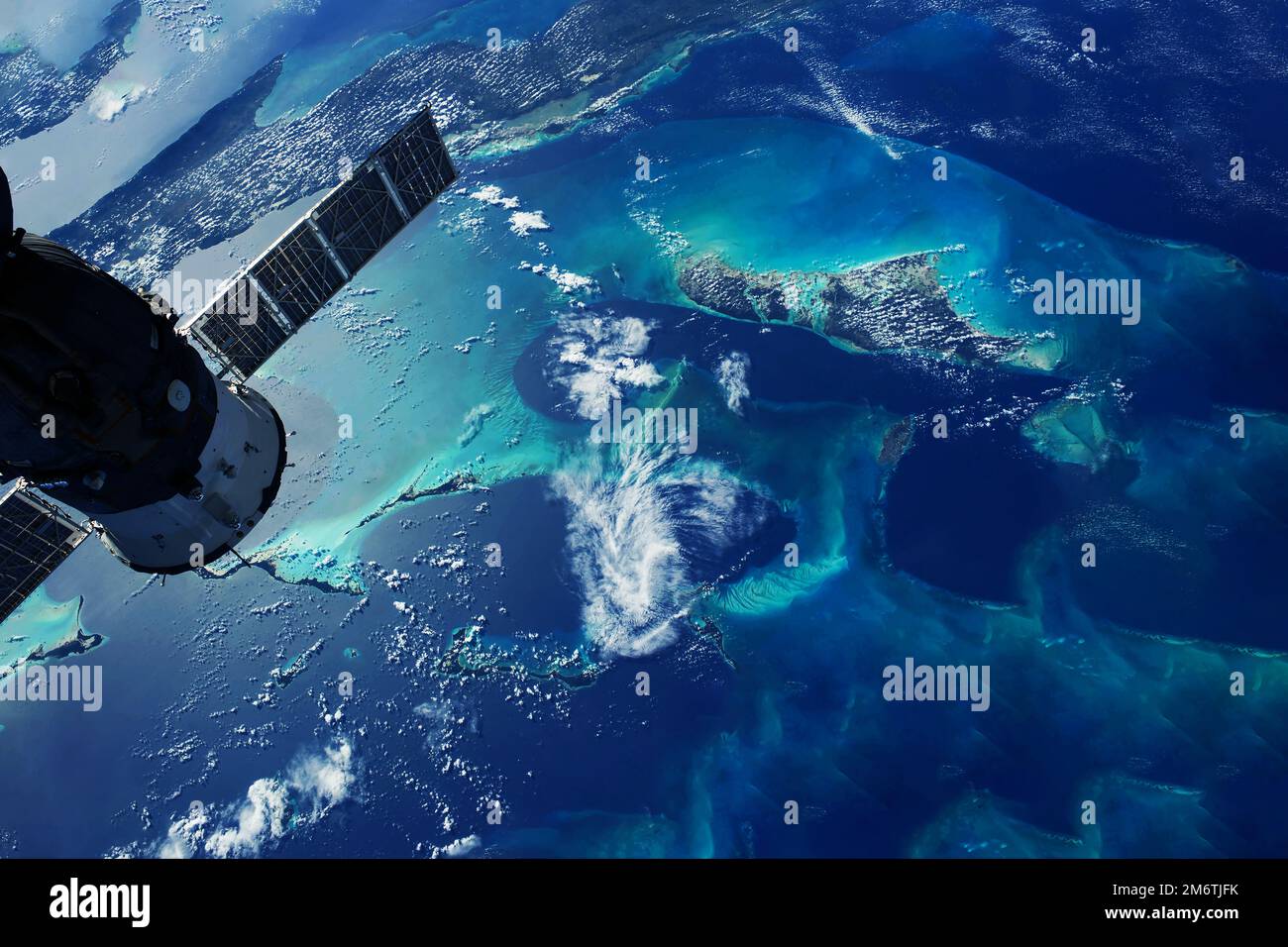 Spaceship over the Earth. Elements of this image furnished by NASA ...