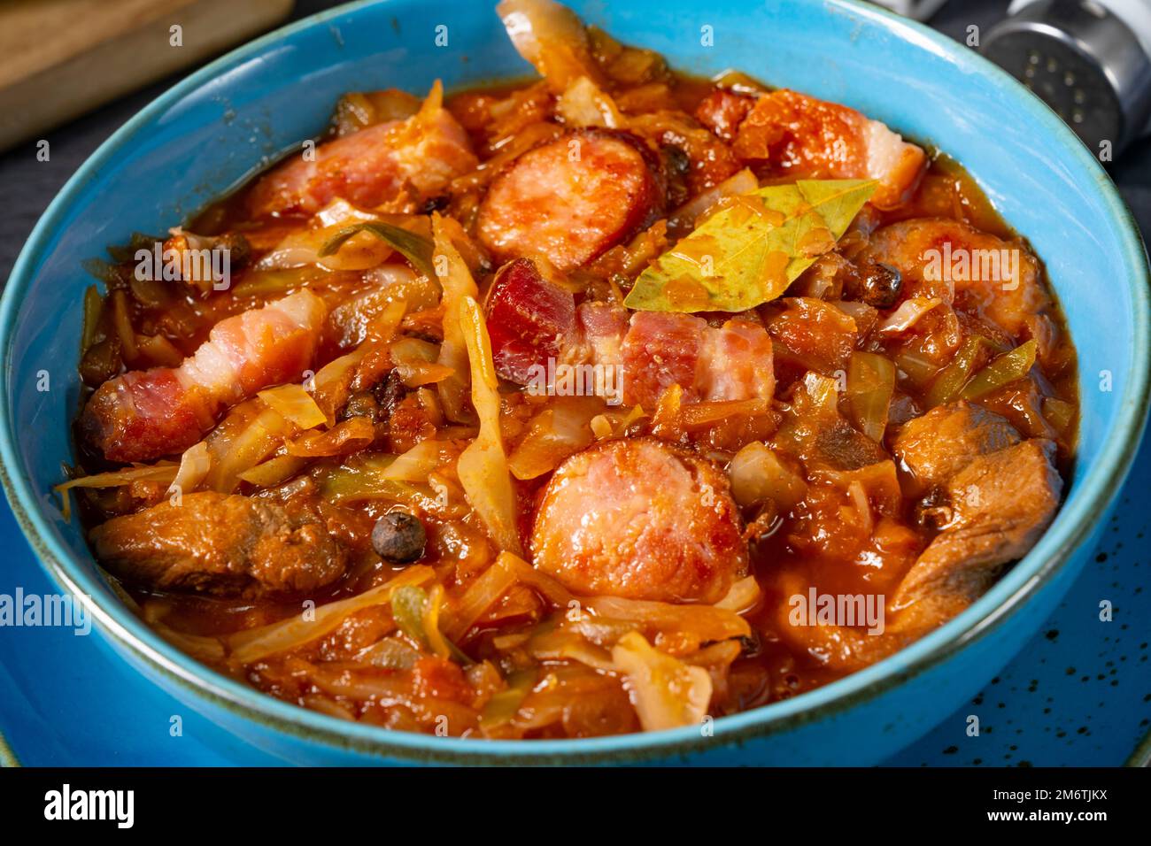 Polish bigos with sausage and mushrooms Stock Photo - Alamy