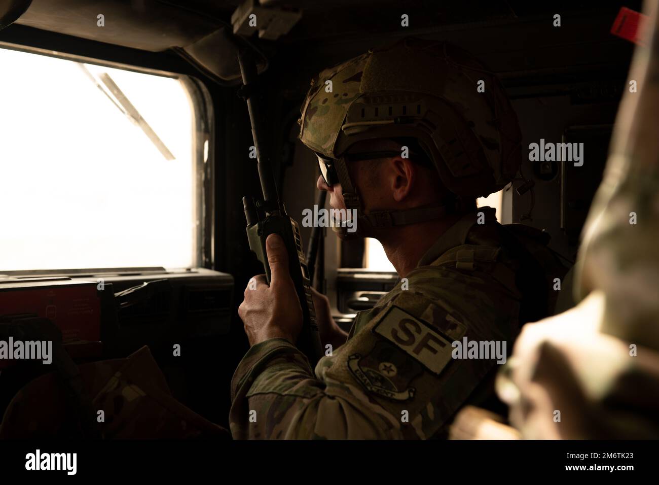 Senior Airman Tristan Lindsay speaks over the radio during a training ...