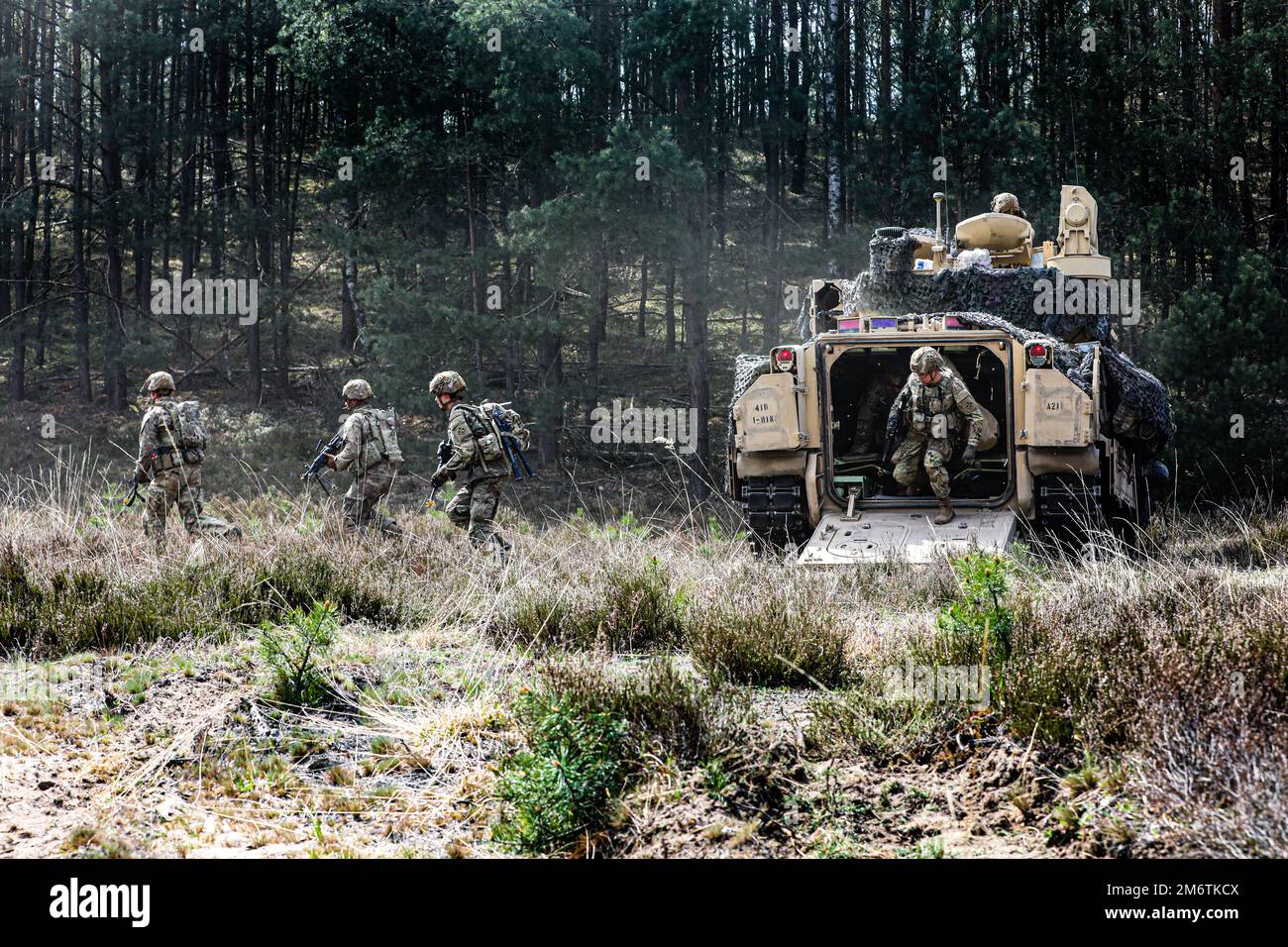 A squad of U.S. Soldiers assigned to the 1st Battalion, 8th Infantry ...