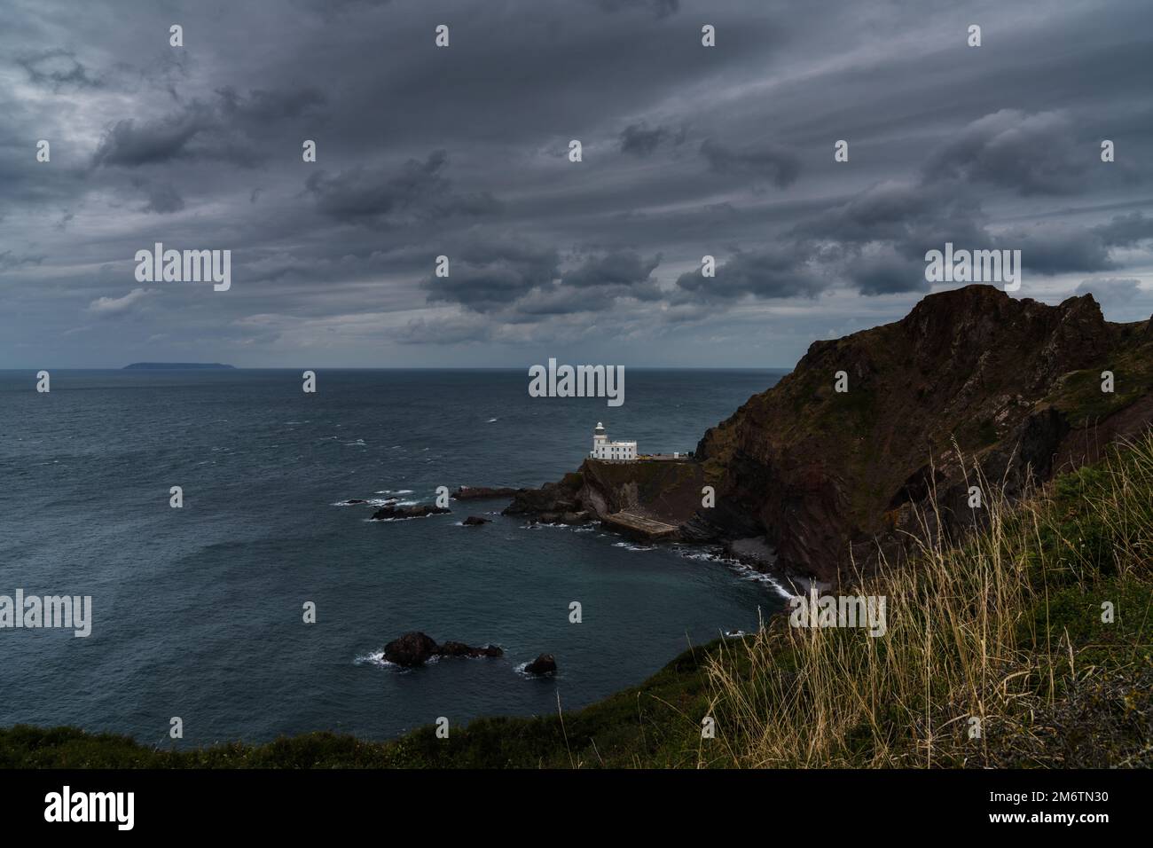 A view of the historic Hartland Point lighthouse and headland on ...