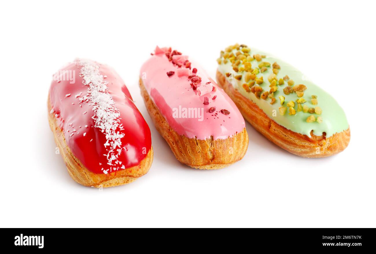 Various glazed eclairs isolated on white background Stock Photo - Alamy