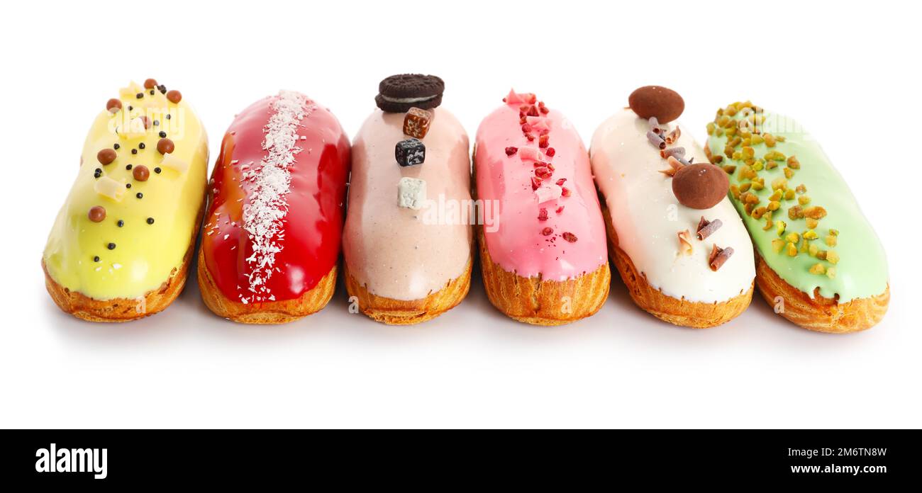 Various glazed eclairs isolated on white background Stock Photo - Alamy