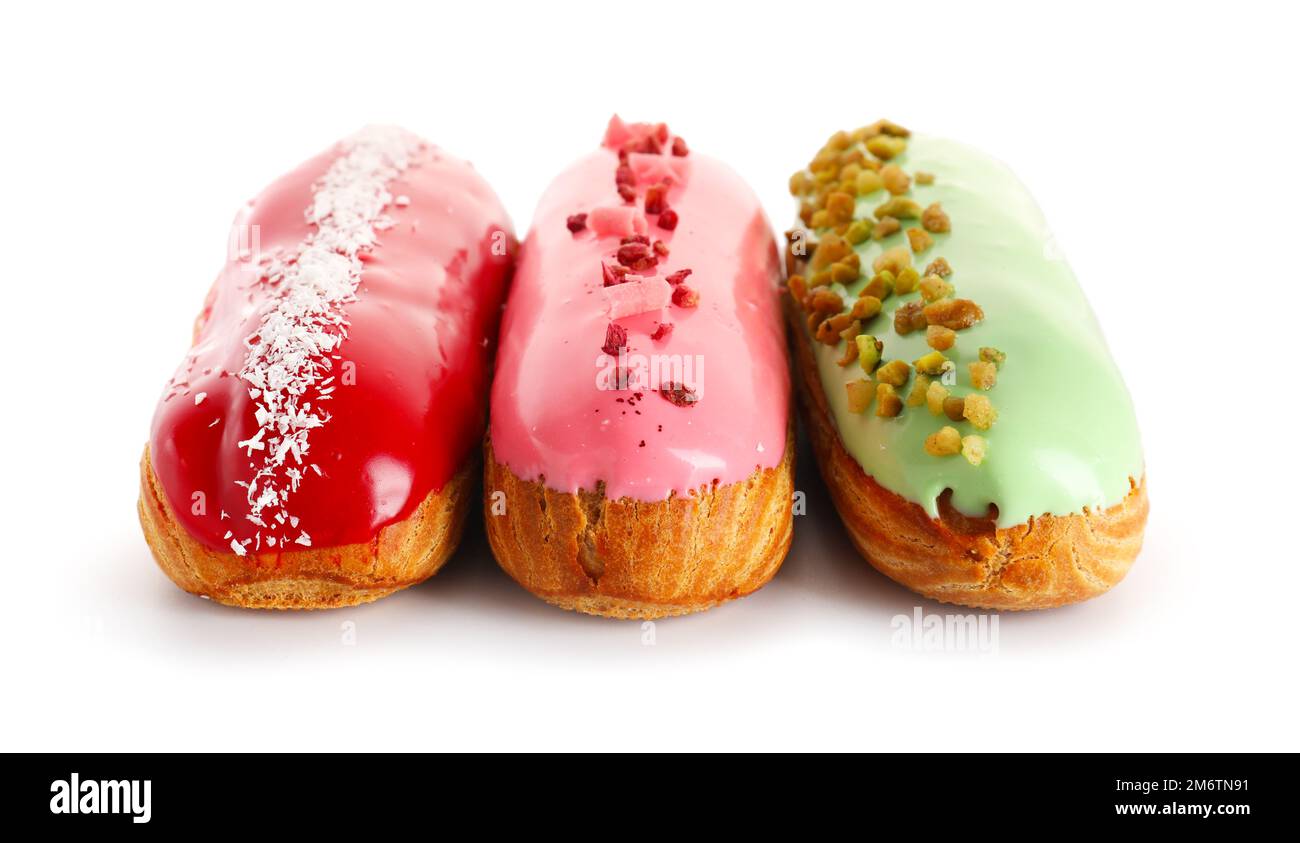 Various glazed eclairs isolated on white background Stock Photo - Alamy