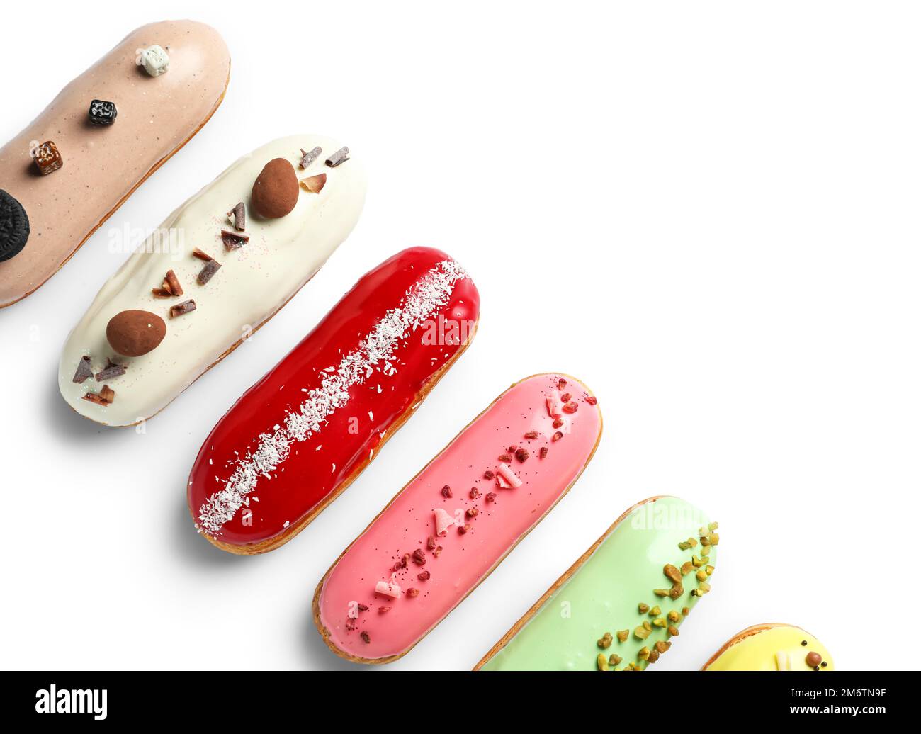 Various glazed eclairs isolated on white background Stock Photo - Alamy