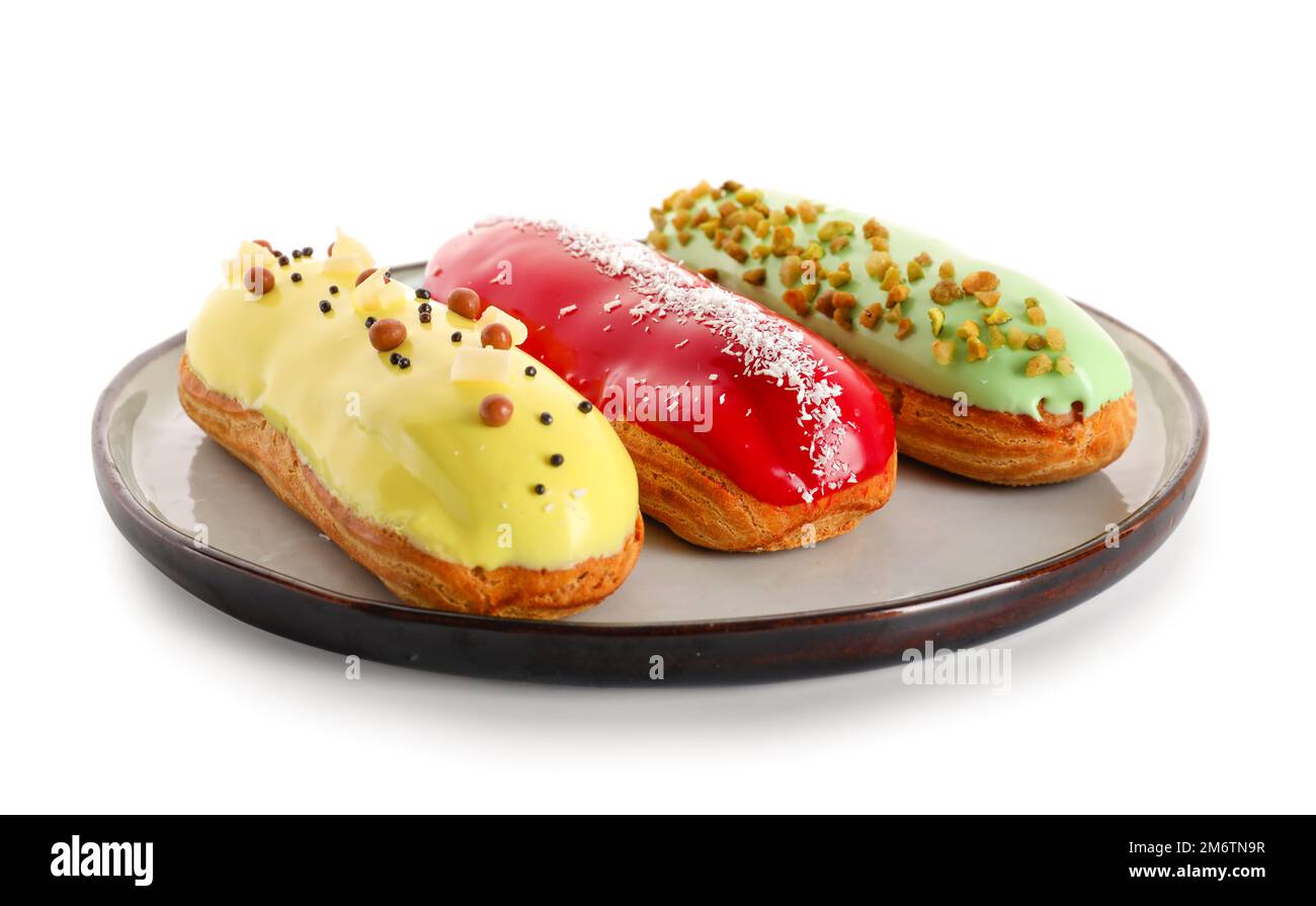 Plate with various glazed eclairs isolated on white background Stock ...