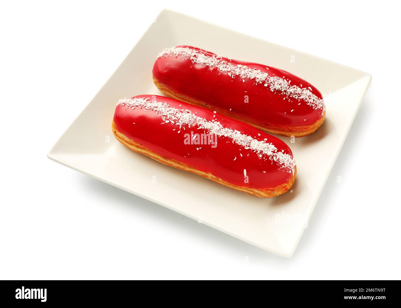 Plate with delicious glazed eclairs isolated on white background Stock ...