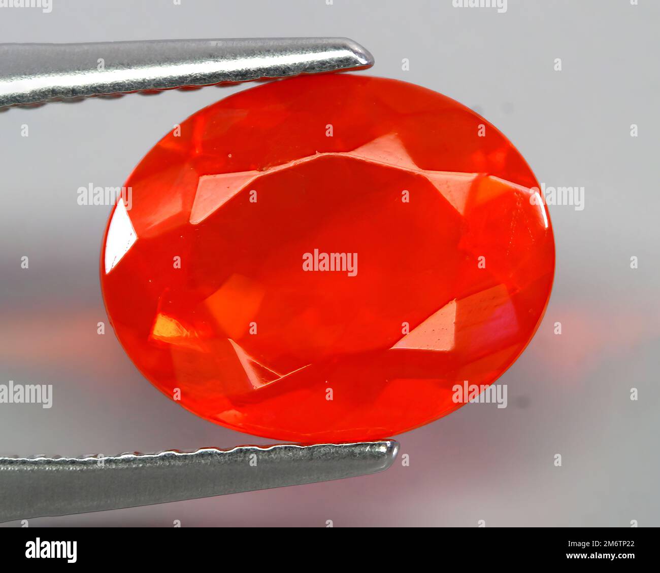 Natural beautiful stone opal on gray background Stock Photo - Alamy