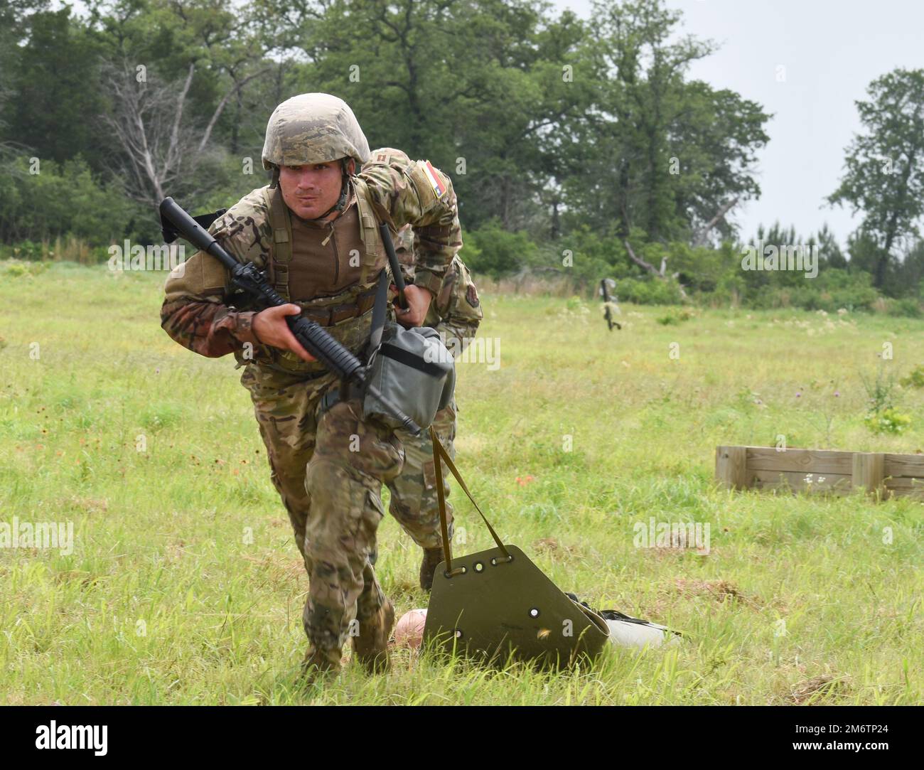 Chilean Marine Lance Cpl. Angel Andrés Vásquez Sagredo, hauls a ...