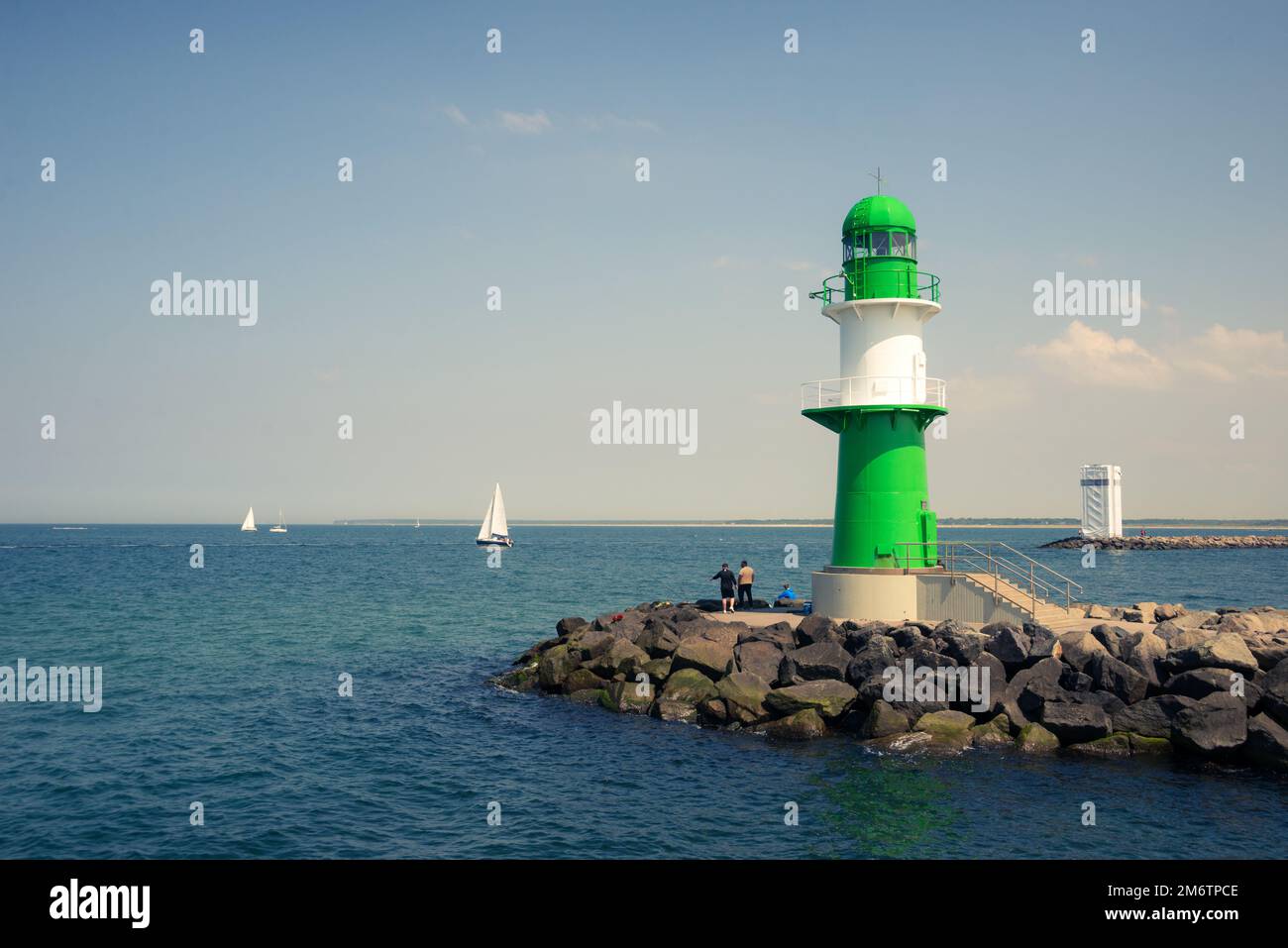 Westmole lighthouse in WarnemÃ¼nde near Rostock, Germany Stock Photo ...