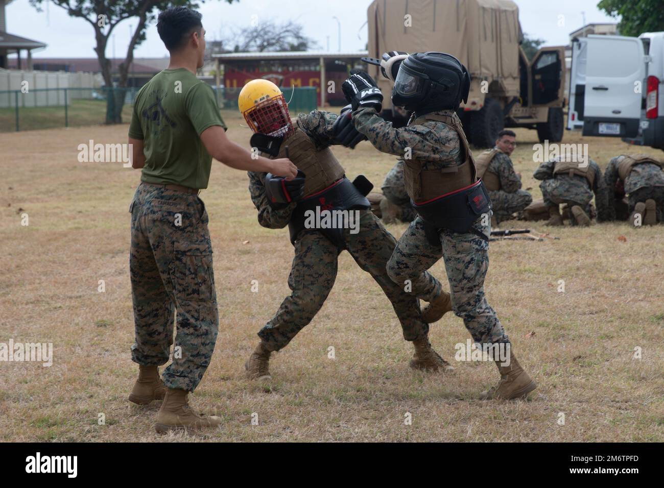 U.S. Marines spar with training weapons during the culminating event of ...