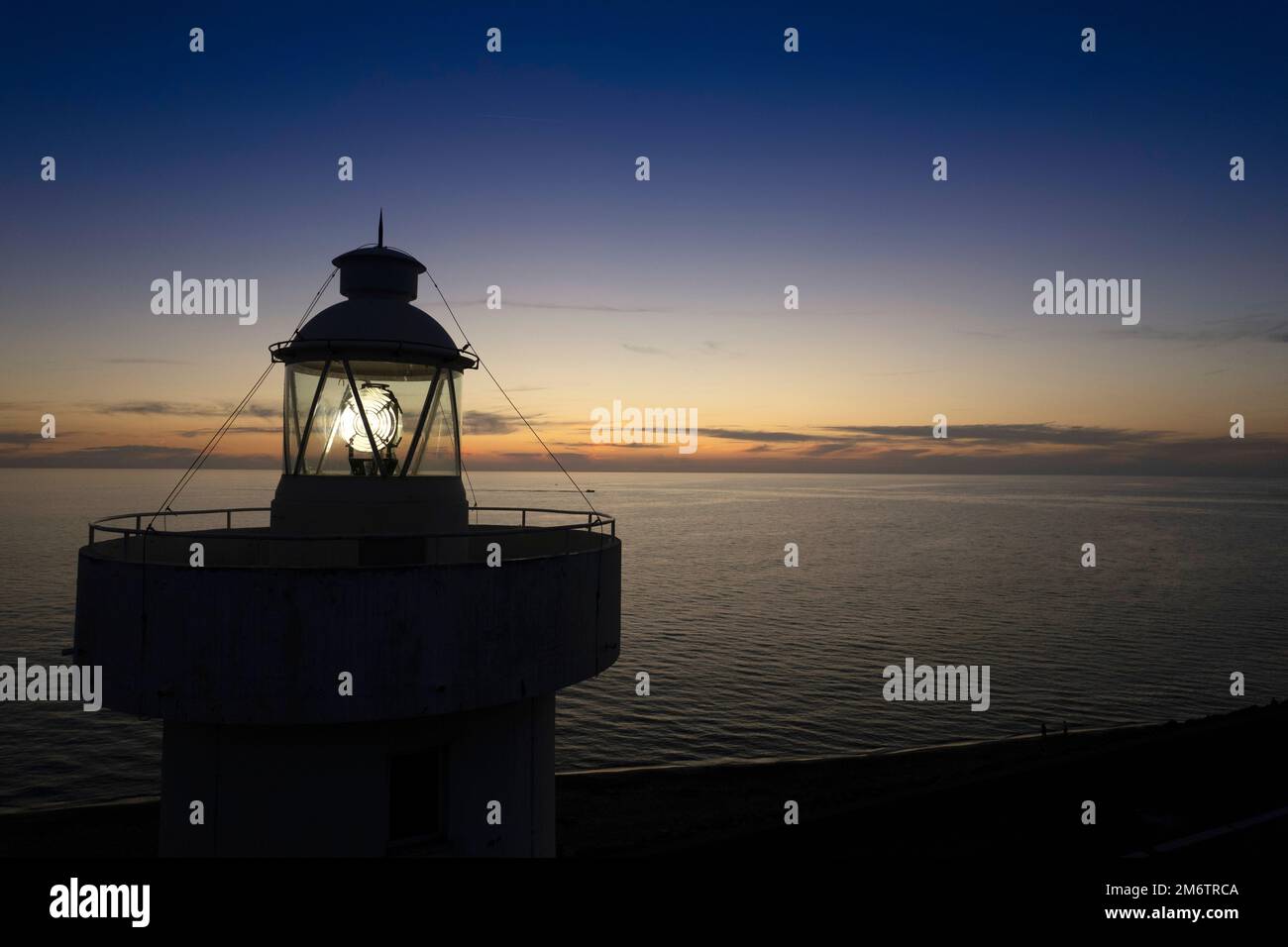 Aerial view of a maritime lighthouse taken at night Stock Photo - Alamy