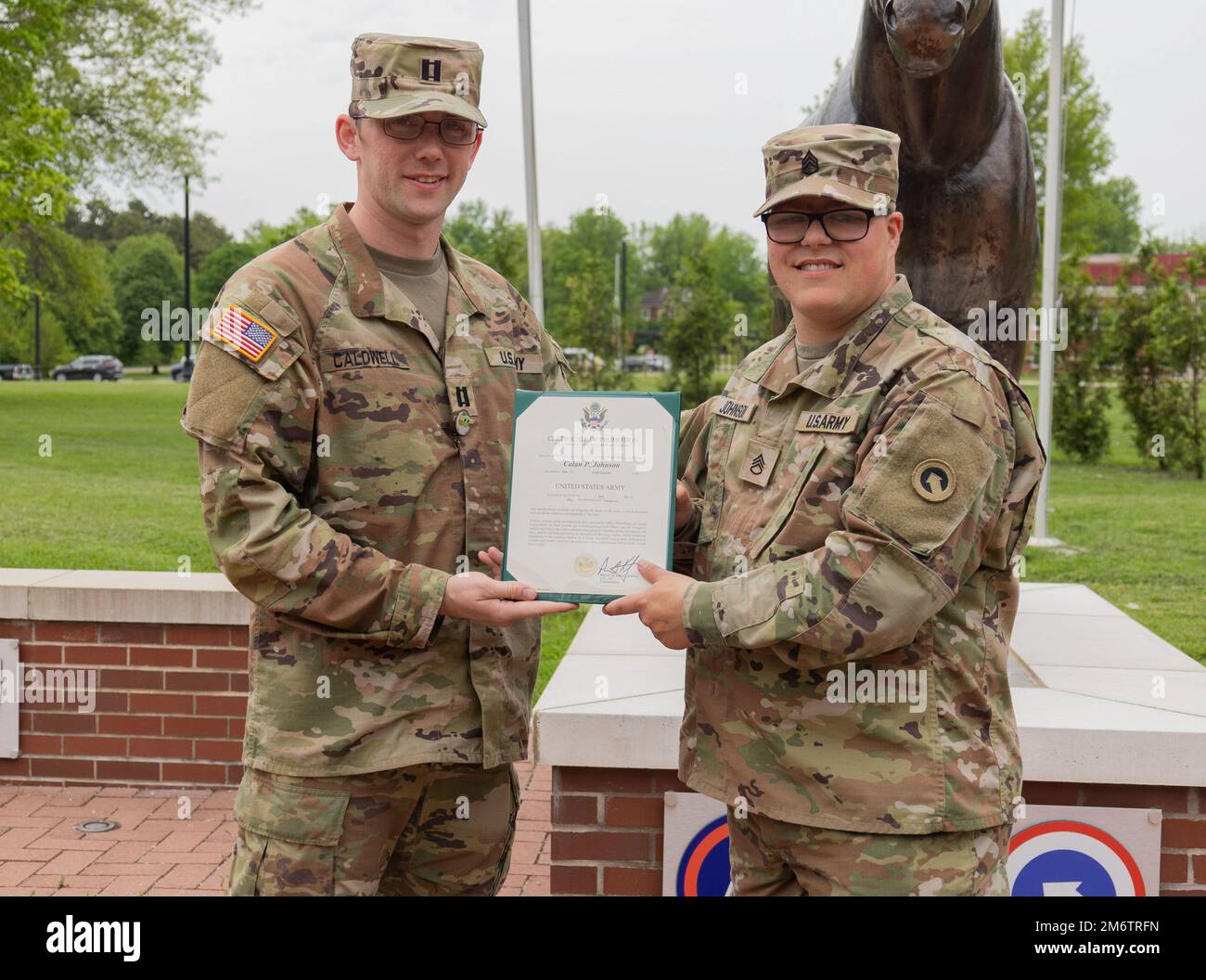 Capt. Koty Caldwell (left), operations officer in charge, 1st Theater ...