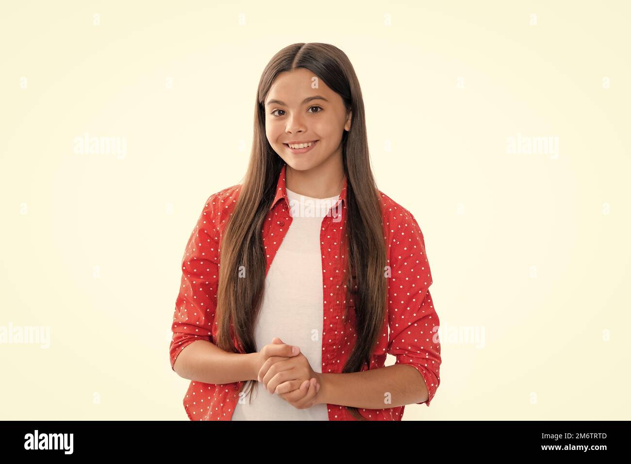 Portrait of happy smiling teenage child girl. Cute young teenager girl against a isolated ...