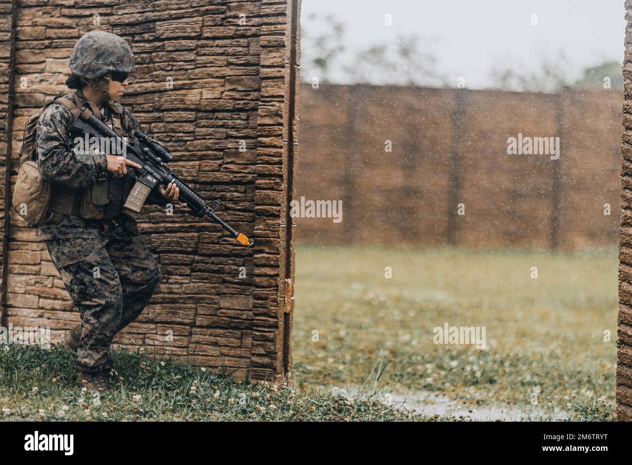 A U.S. Marine with Marine Air Support Squadron (MASS) 2 takes simulated ...
