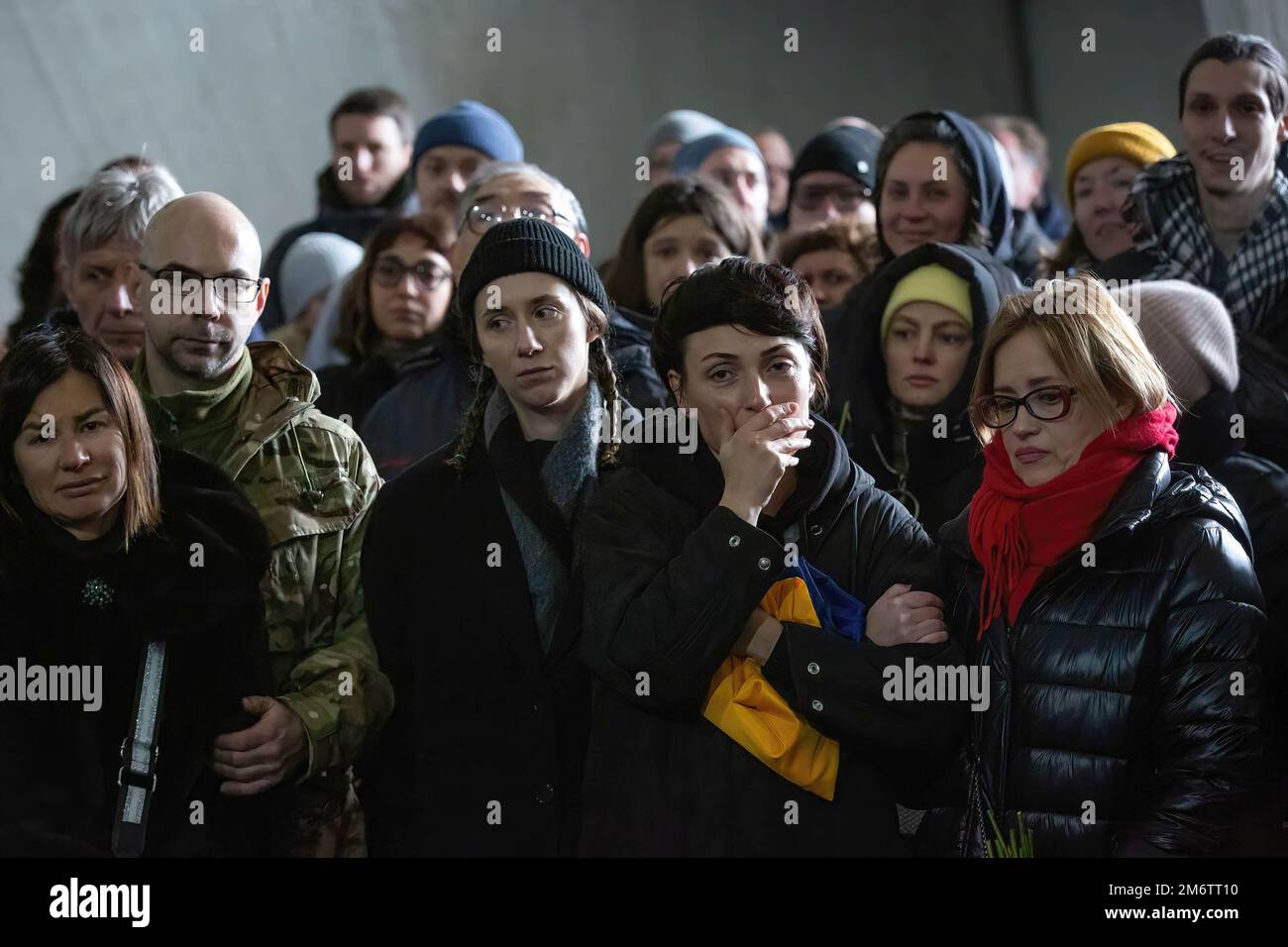 Relatives and friends mourn during the farewell ceremony for Viktor ...