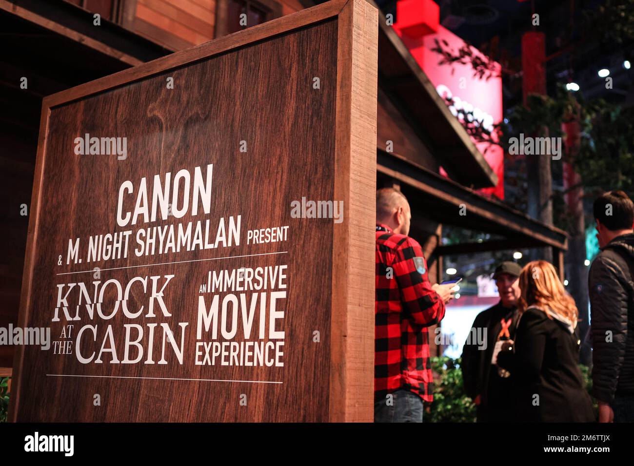 January 5, 2023: CES attendees wait in line to participate in an ...