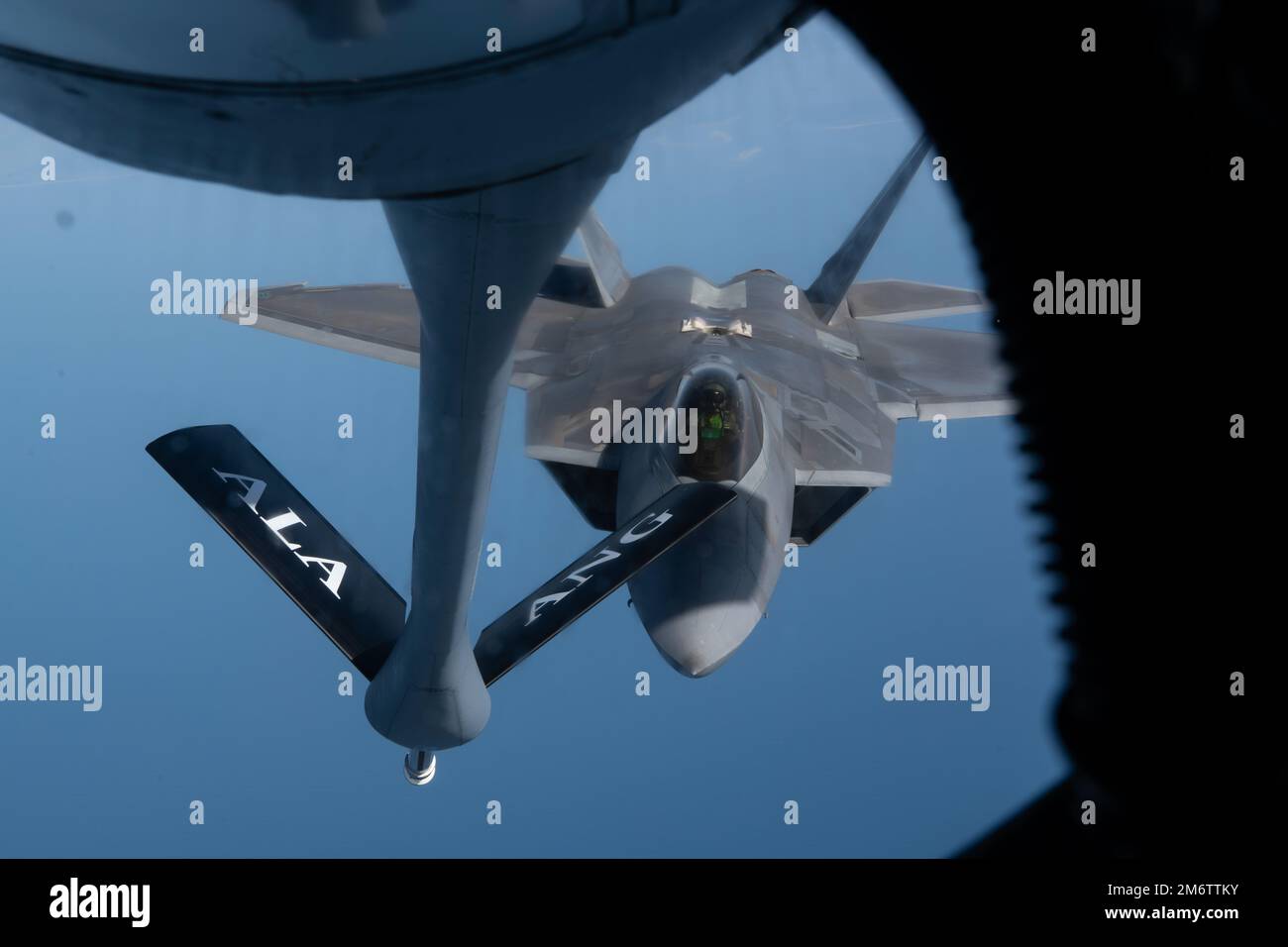 A U.S. Air Force F-22 Raptor with the 325th Fighter Wing, approaches a ...