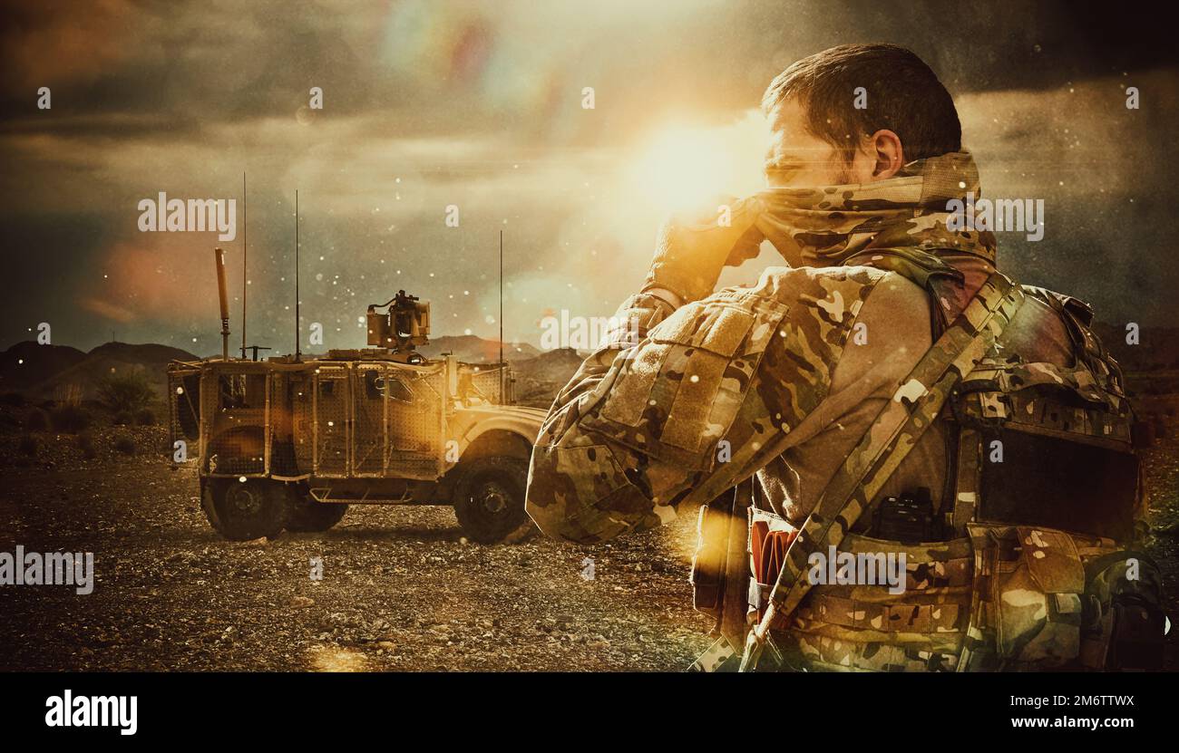 Army soldier in Combat Uniforms with an assault rifle and combat helmet ...