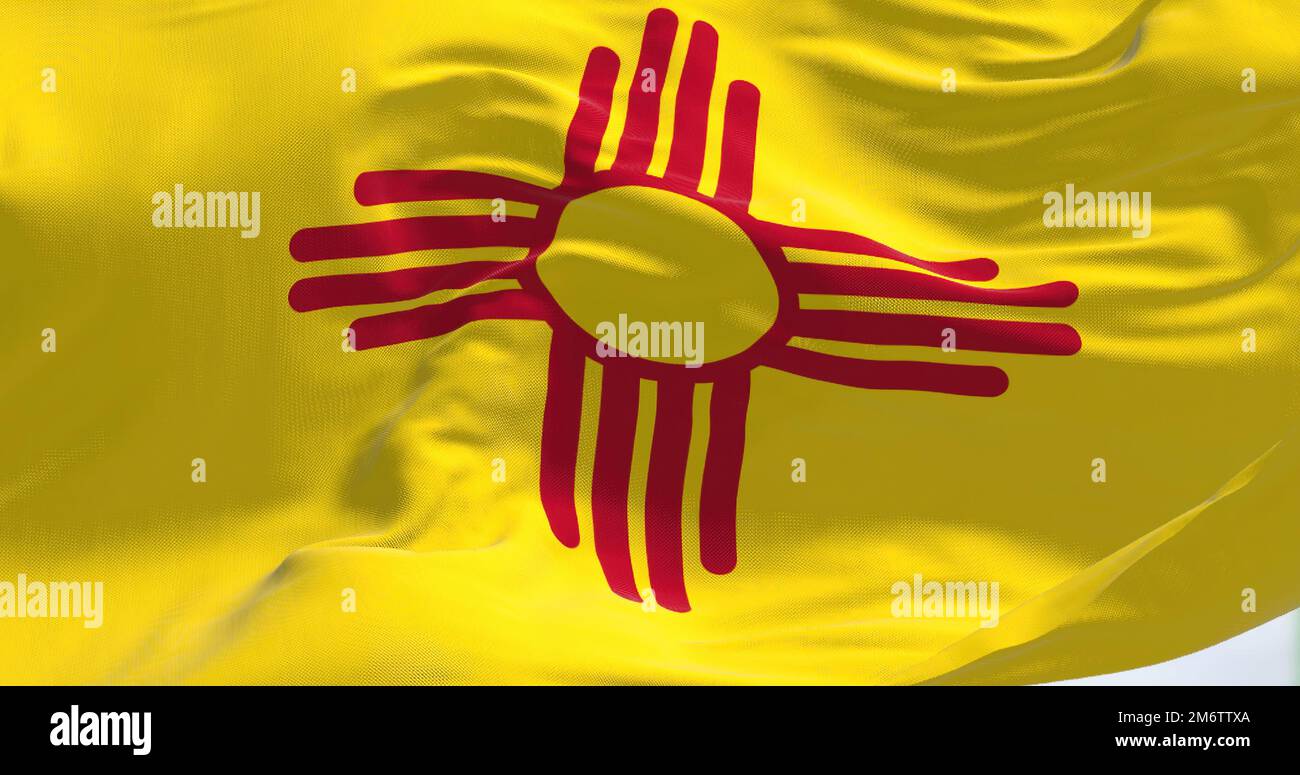 Flag of New Mexico state waving in the wind on a clear day Stock Photo ...