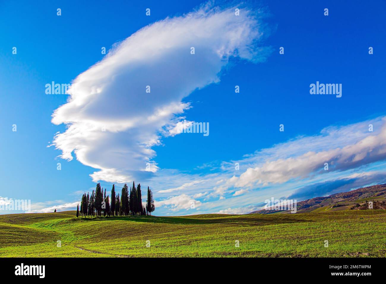 Bizarre clouds lit by the sunset Stock Photo - Alamy