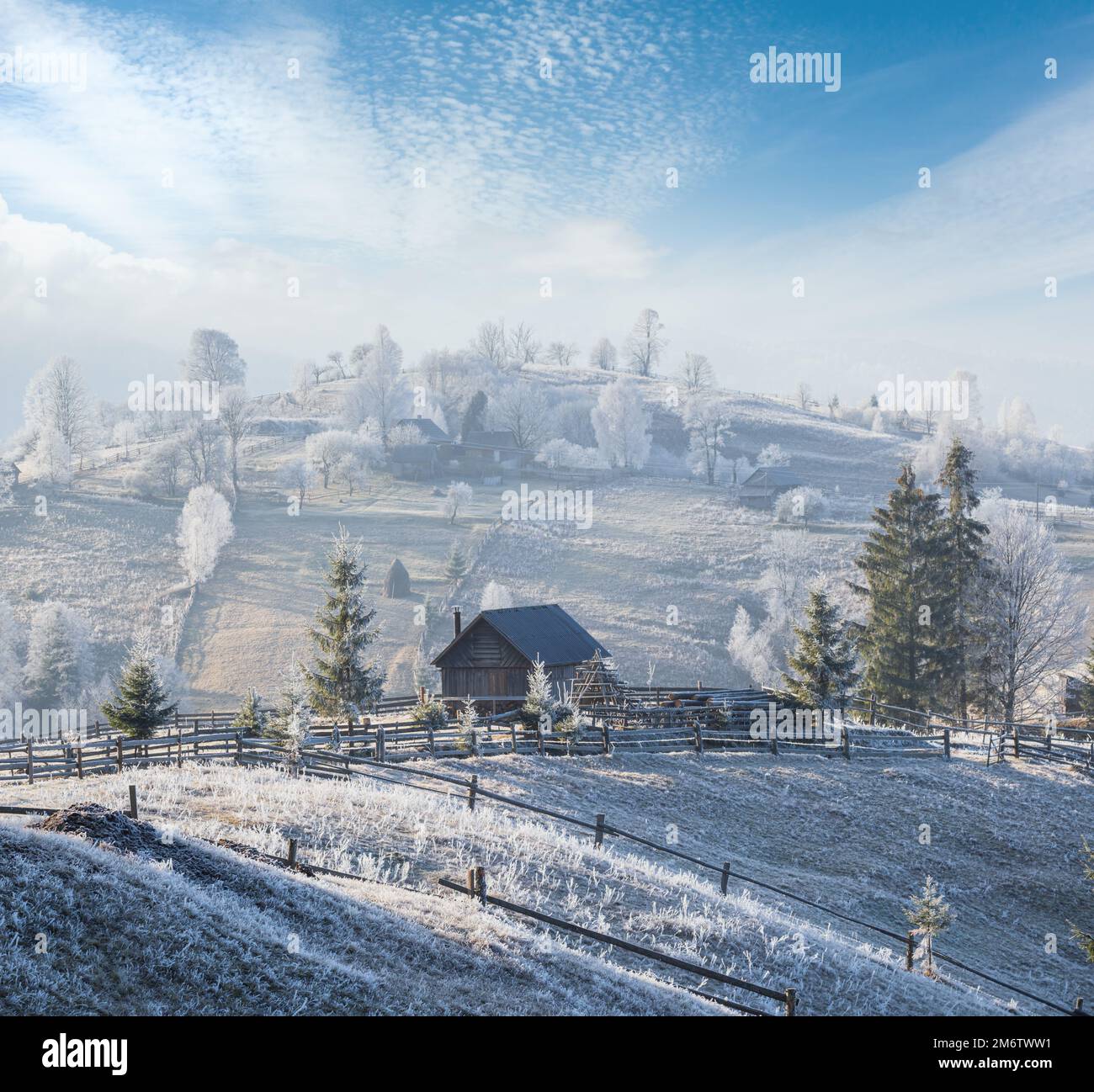 Winter coming. Picturesque foggy and moody morning scene in late autumn ...