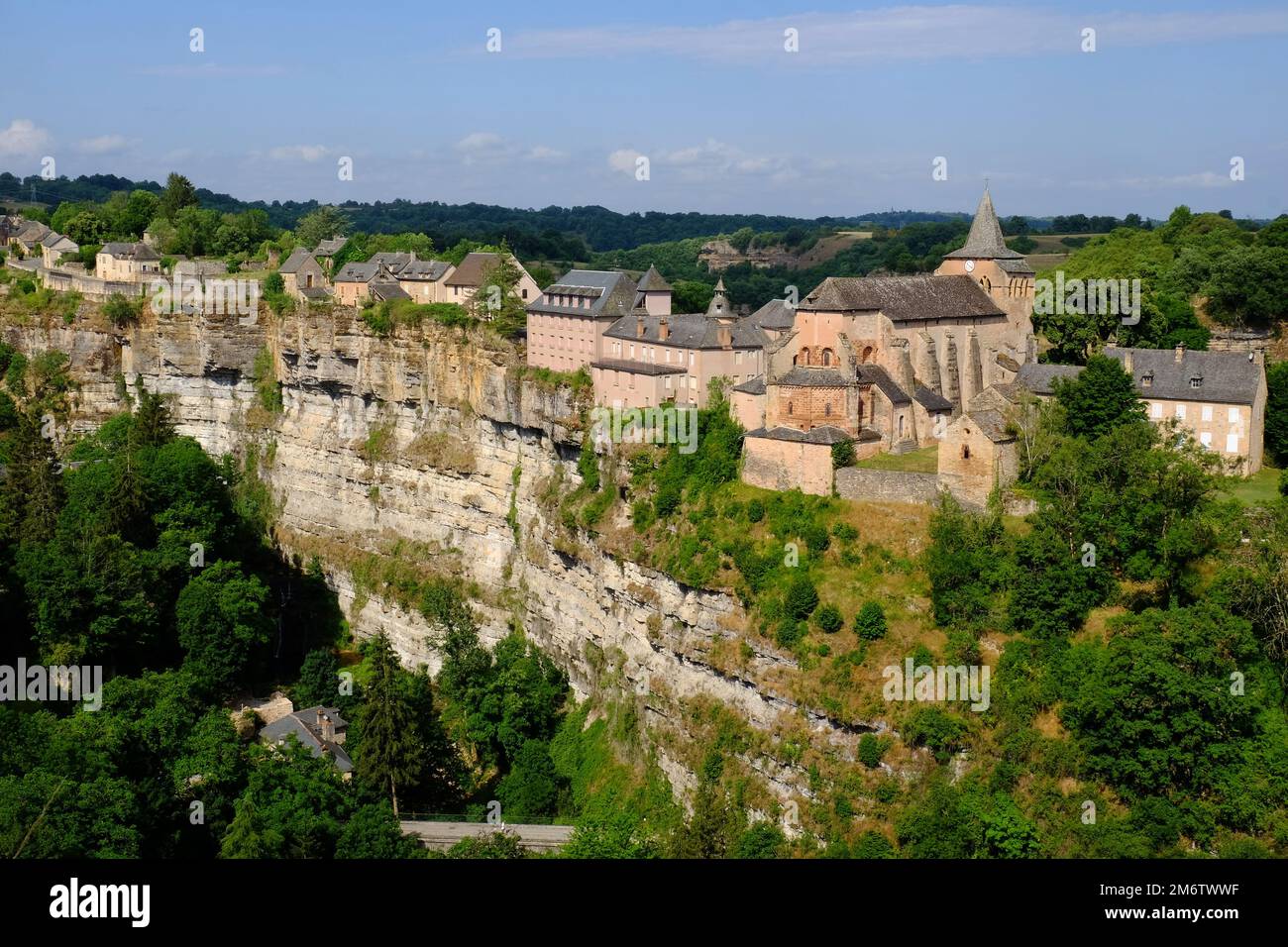 Bozouls: St Fauste Church and buildings perched above Dourdou de ...