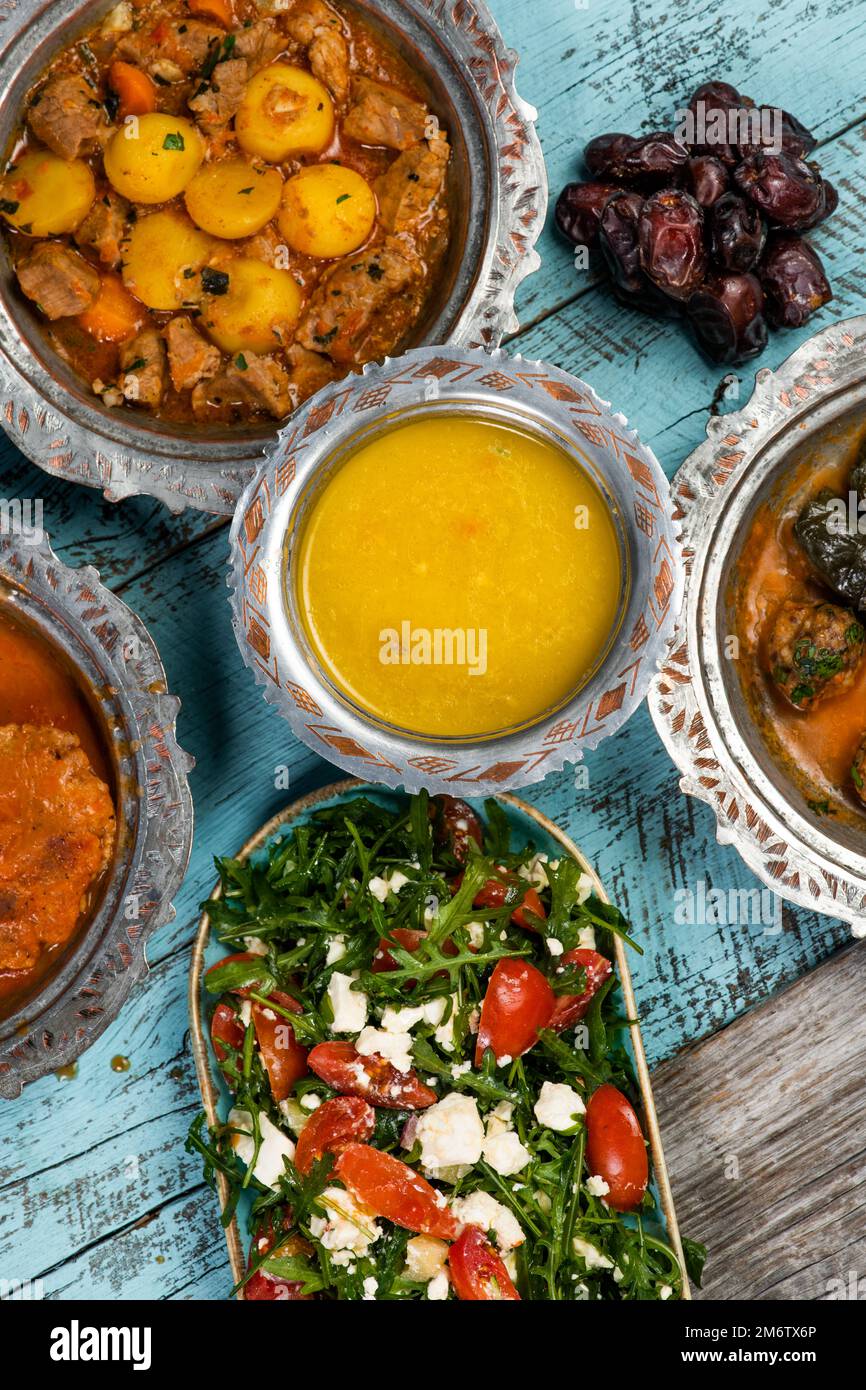 Eid Mubarak Traditional Ramadan Iftar dinner. Assorted tasty food in ...