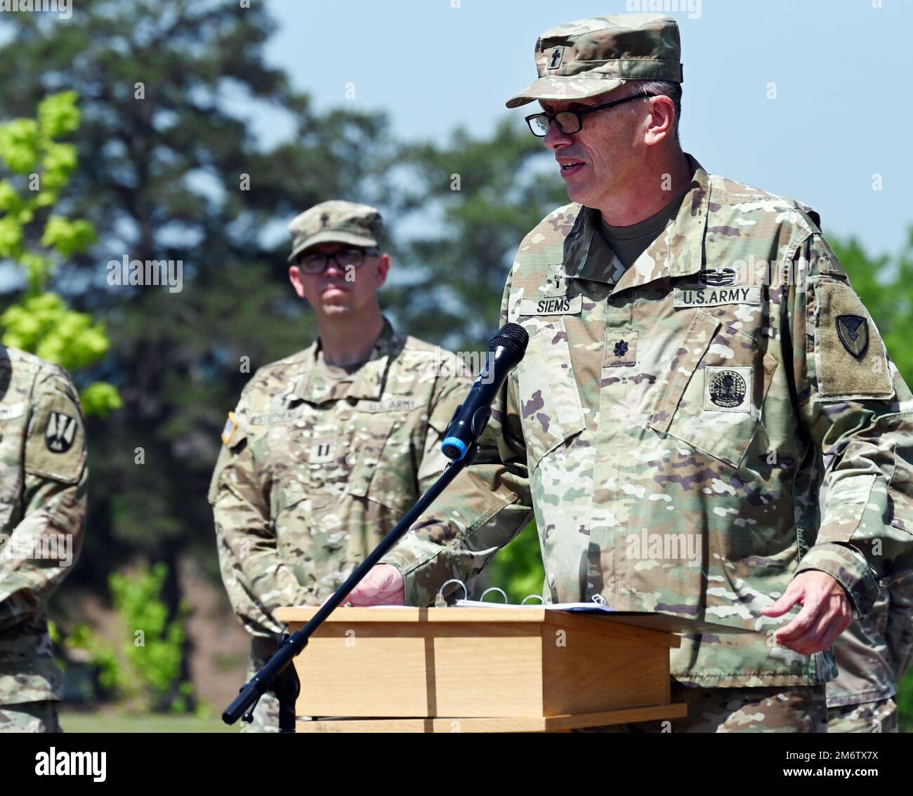 Chaplain (Lt. Col.) Leonard R. Siems, deputy garrison chaplain, delivers the keynote speech ...