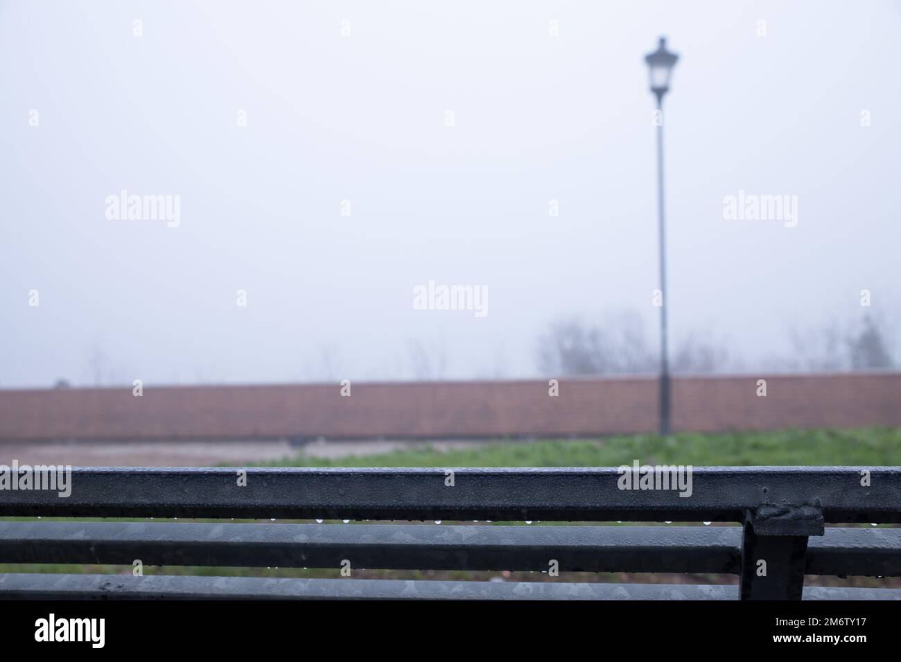 A bench along the Janiculum promenade in Rome shrouded in fog (Photo by ...