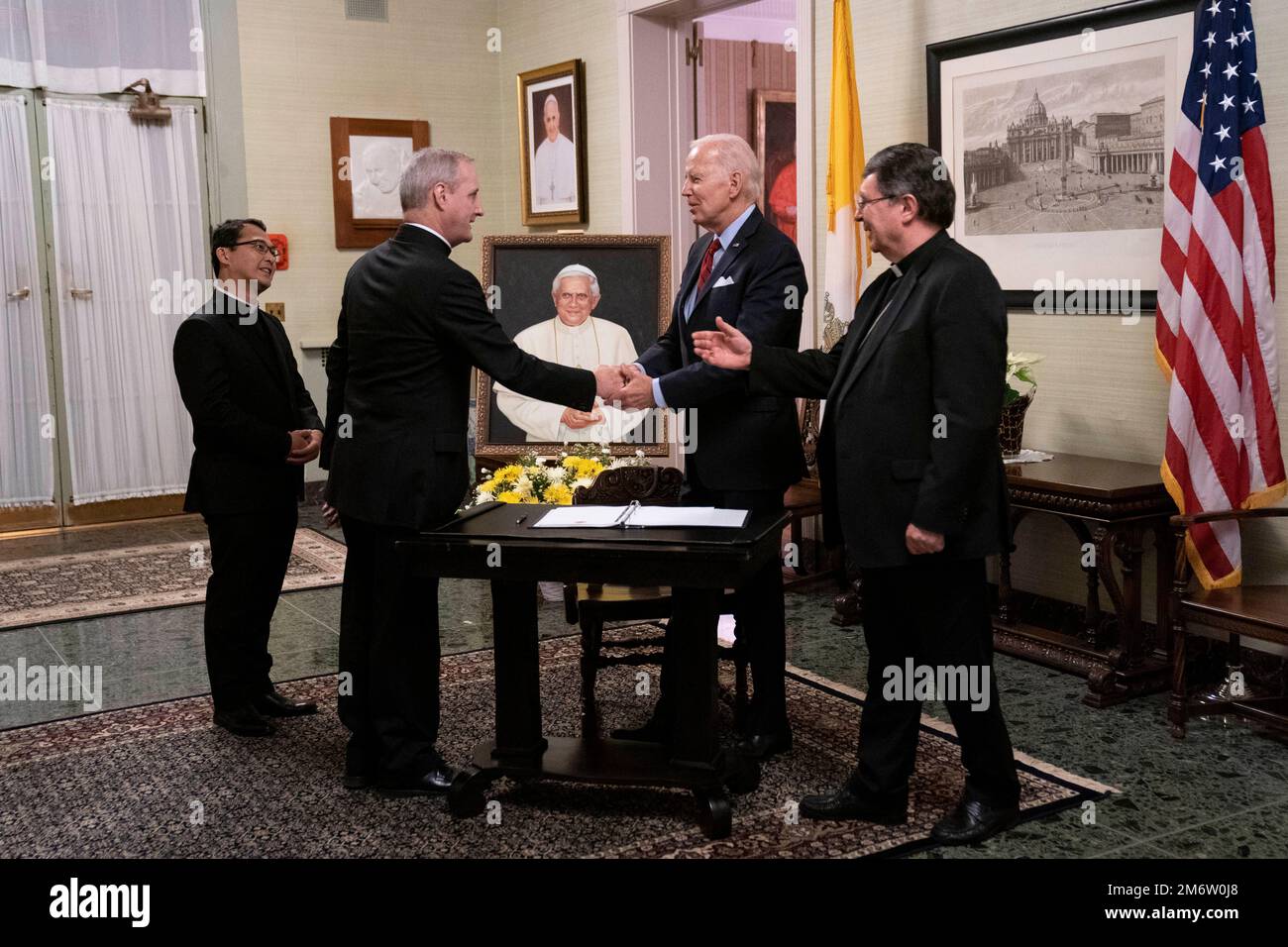US President Joe Biden speaks with Msgr. John Paul Pedrera, Msgr ...