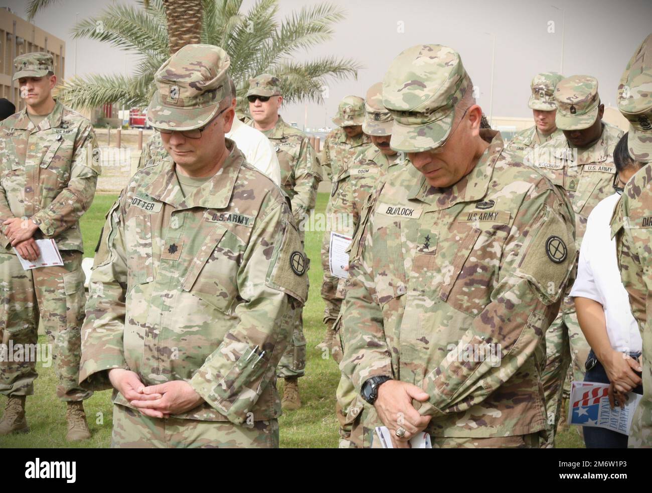Major General William Blaylock and Lt. Col. John Potter pray during the ...