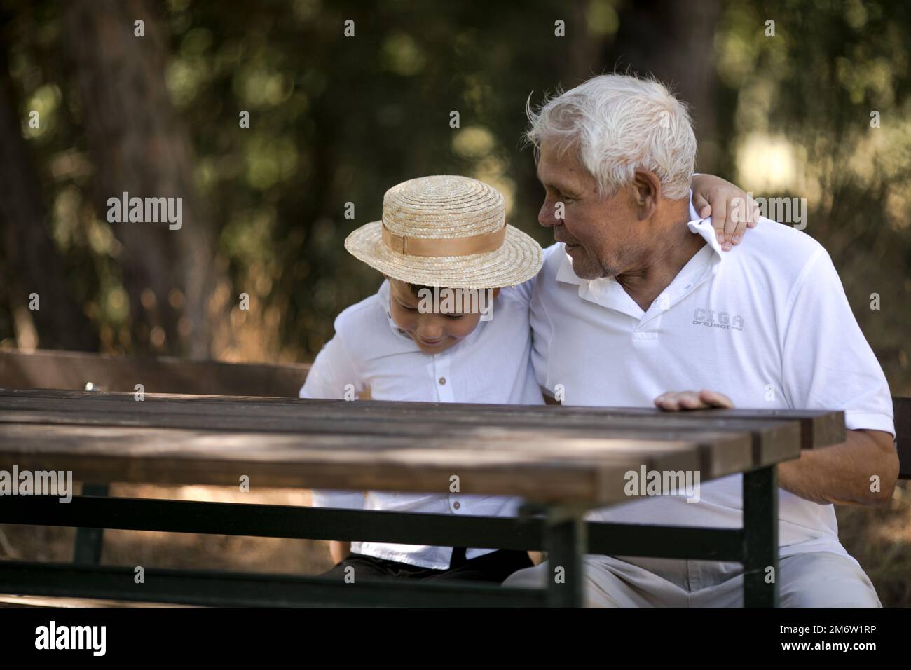 Happy senior man Grandfather with cute little boy grandson playing in ...