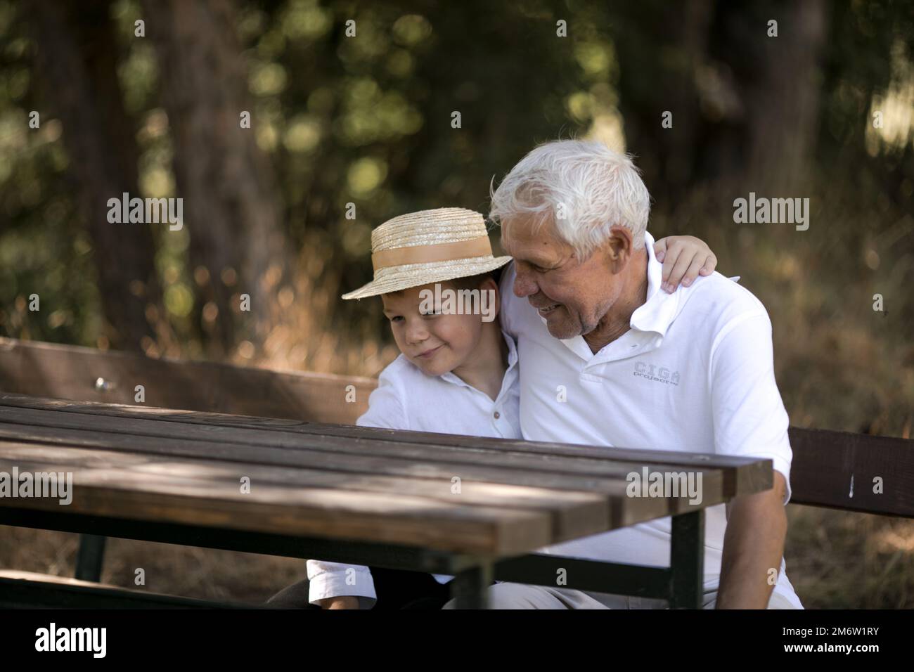 Happy senior man Grandfather with cute little boy grandson playing in ...