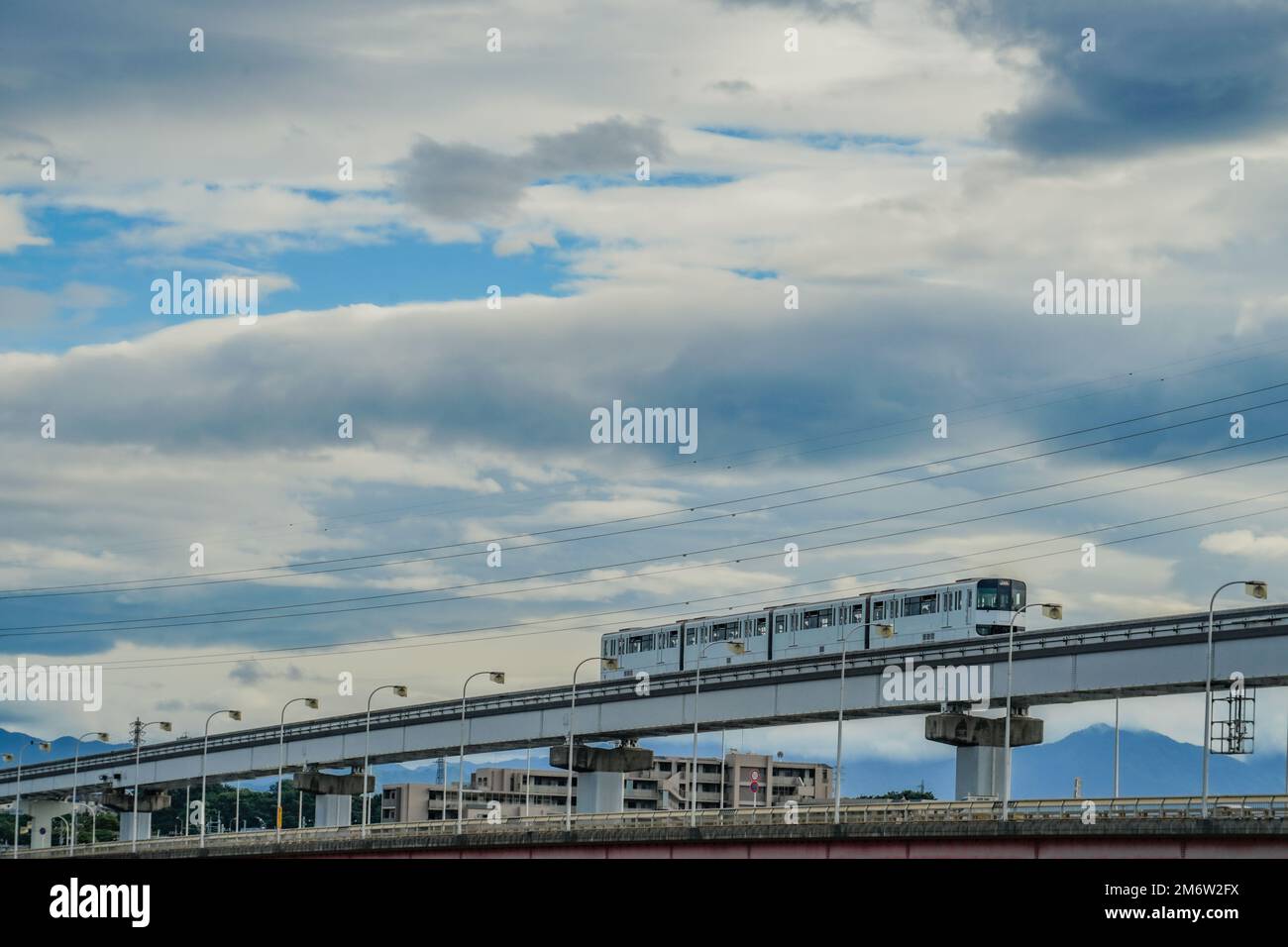 Standing Date Bridge and Tama Monorail and evening Stock Photo - Alamy