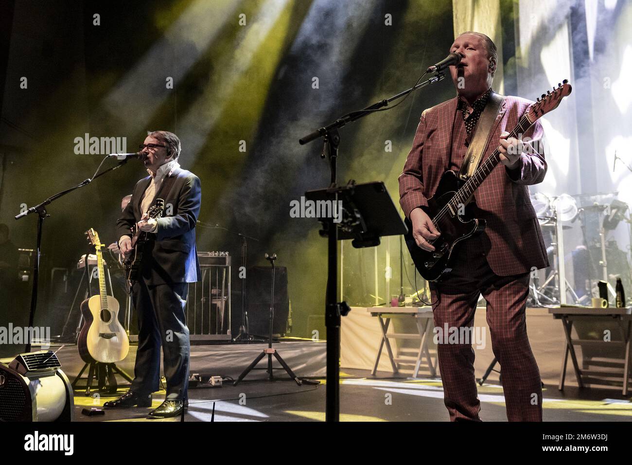 GUILDFORD, ENGLAND: Dr John Cooper Clarke and Squeeze perform on stage ...