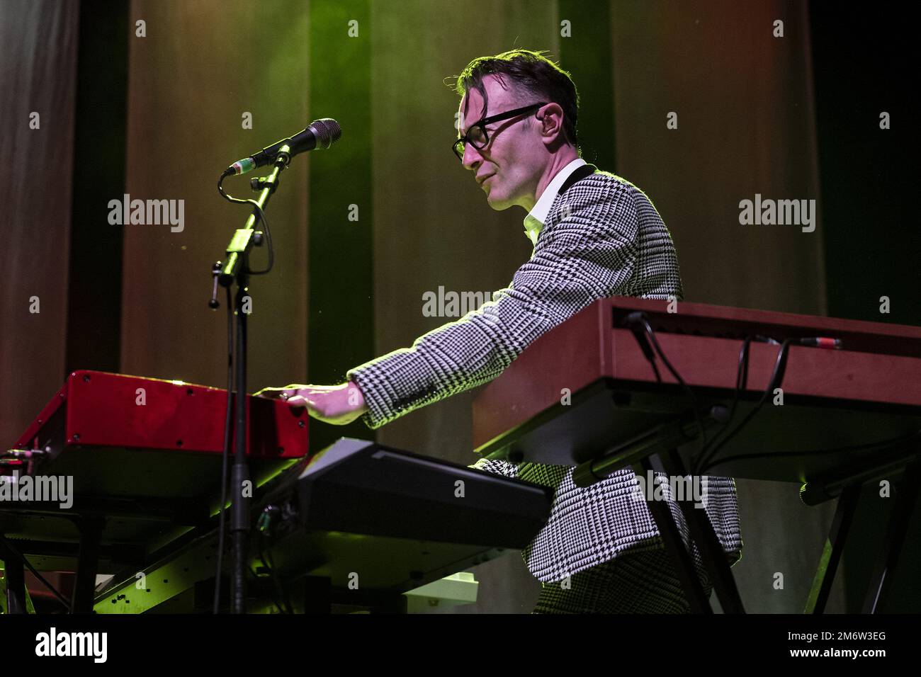 GUILDFORD, ENGLAND: Dr John Cooper Clarke and Squeeze perform on stage at G Live. Featuring ...