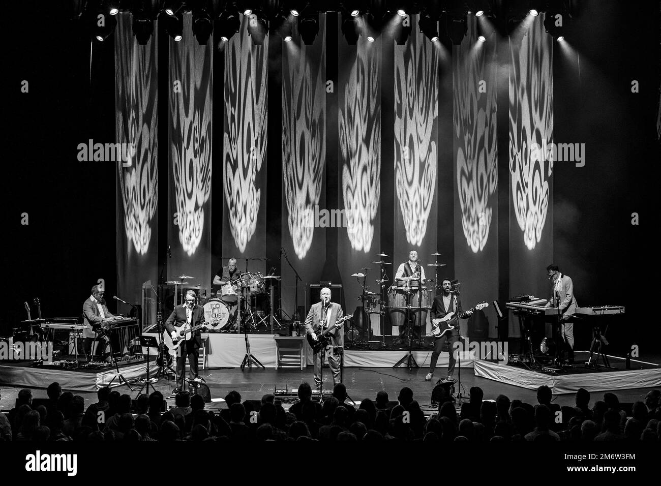 GUILDFORD, ENGLAND: Dr John Cooper Clarke and Squeeze perform on stage ...