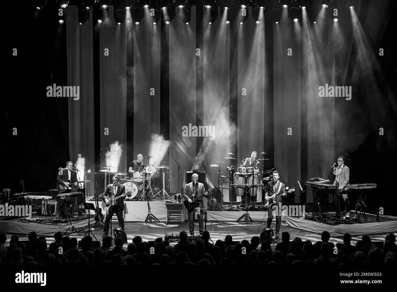 GUILDFORD, ENGLAND: Dr John Cooper Clarke and Squeeze perform on stage ...