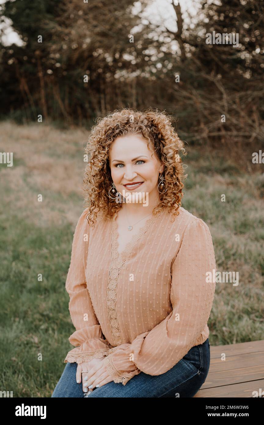 Chief Master Sgt. Amanda Hass sits for photo Stock Photo - Alamy