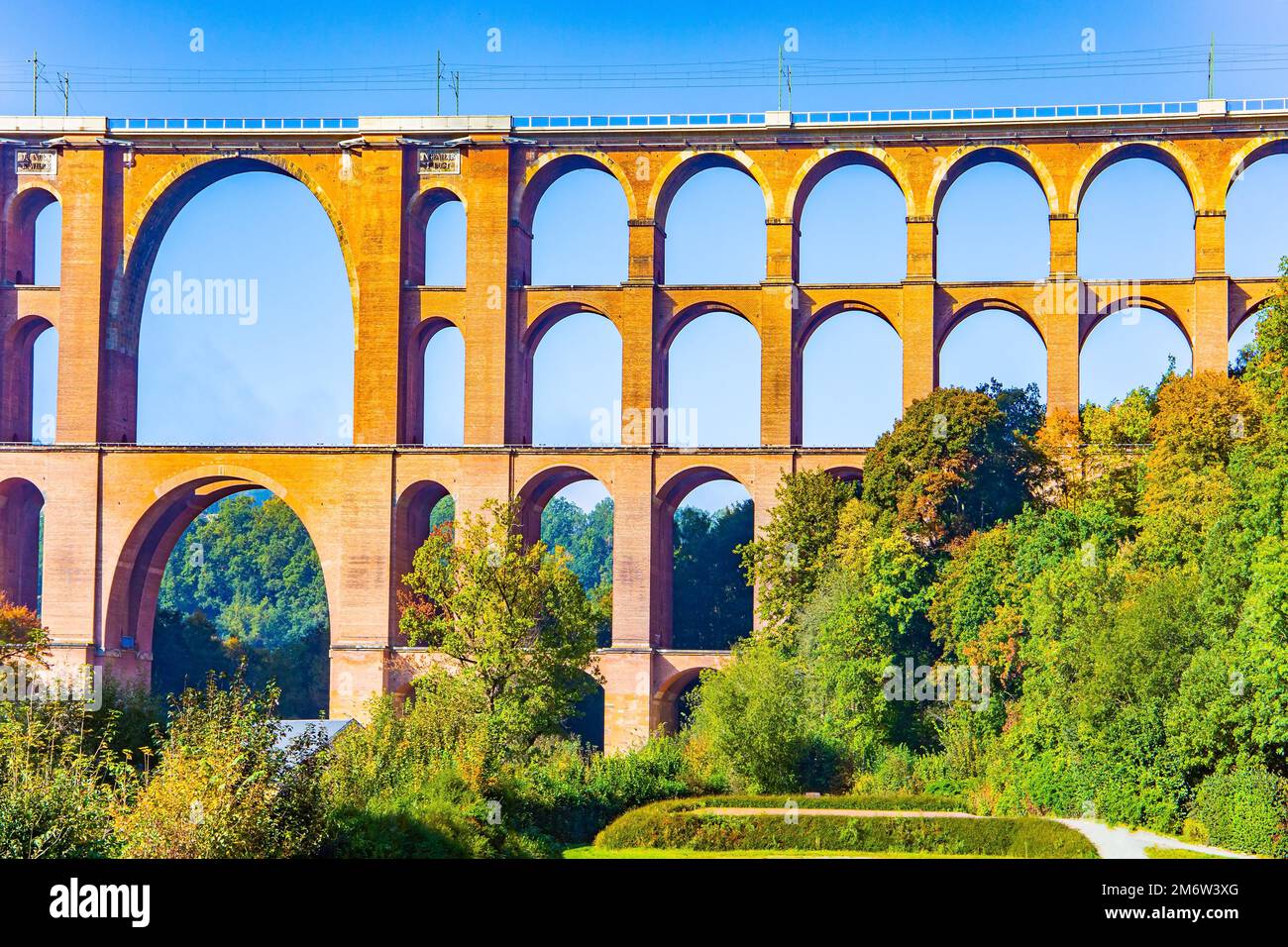 Red train bridge hi-res stock photography and images - Alamy
