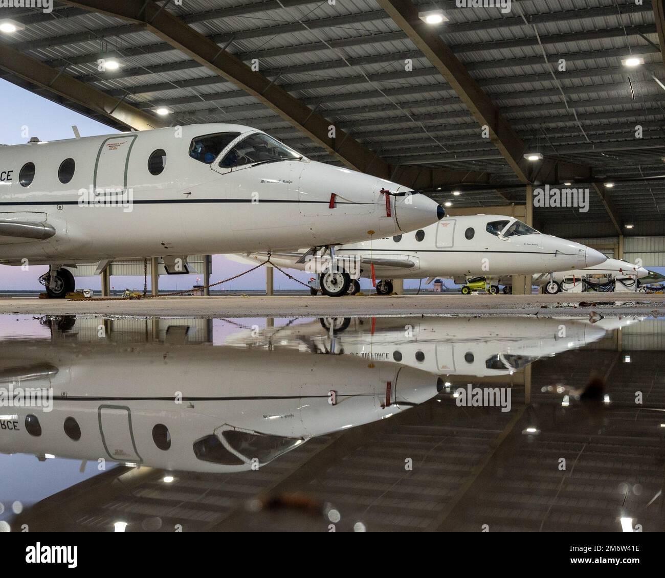 T-1 Jayhawks sit under the sun shelter after a few days of rain at ...