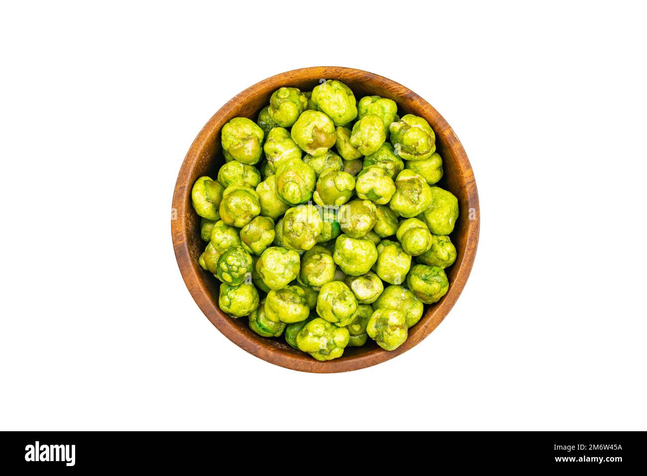 Top view or flat lay of dry crispy wasabi coated green peas in wooden ...