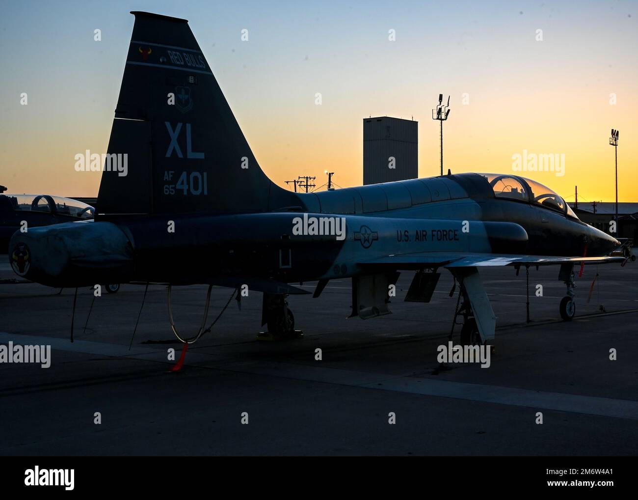 A T-38 Talon is parked on the flightline during a sunset at Laughlin ...