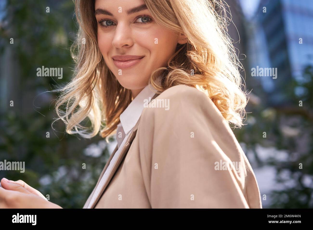 Close up portrait of successful young woman, corporate lady in suit ...