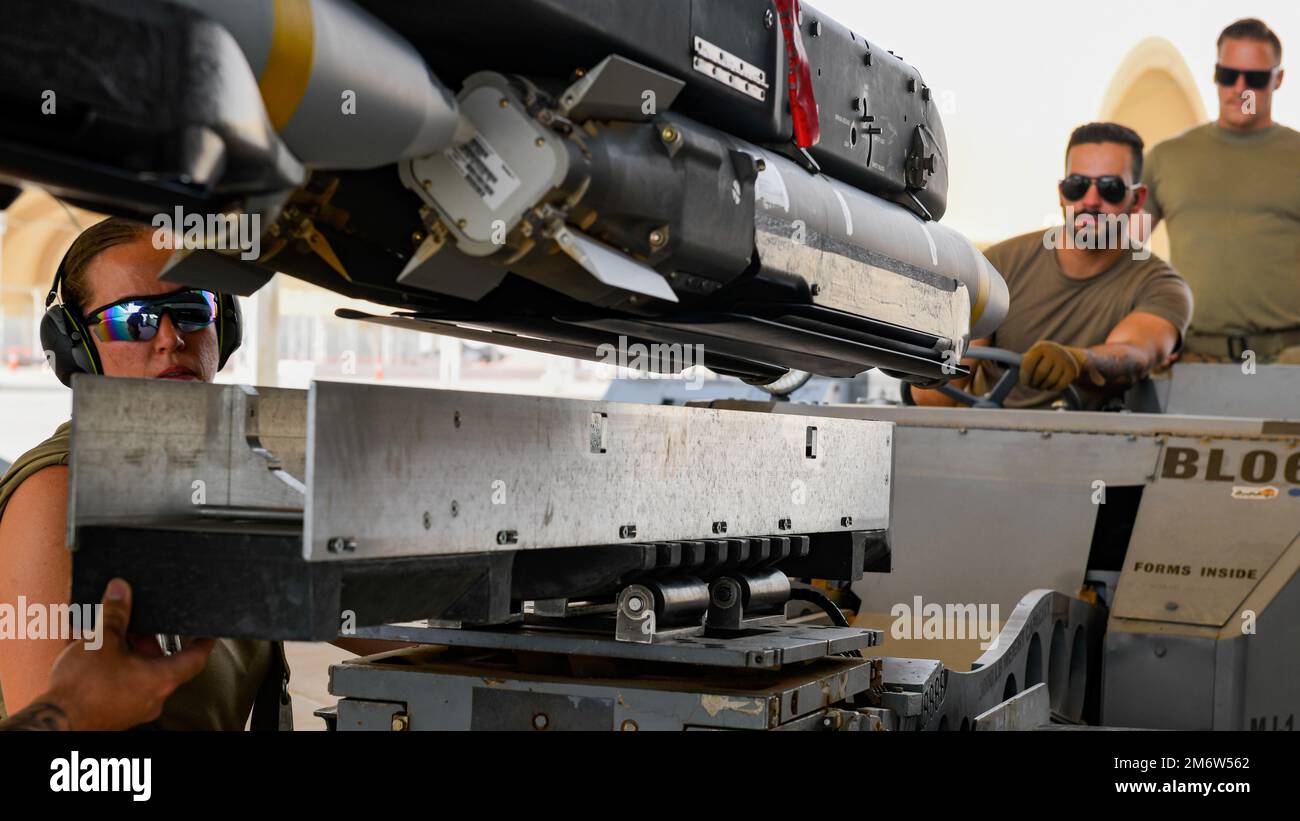 U.S. Airmen assigned to the 379th Expeditionary Civil Engineer Squadron ...