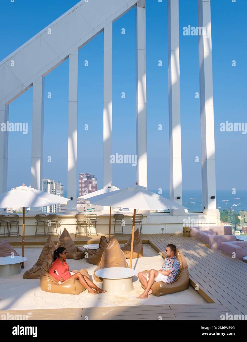 Women rooftop city hi-res stock photography and images - Alamy