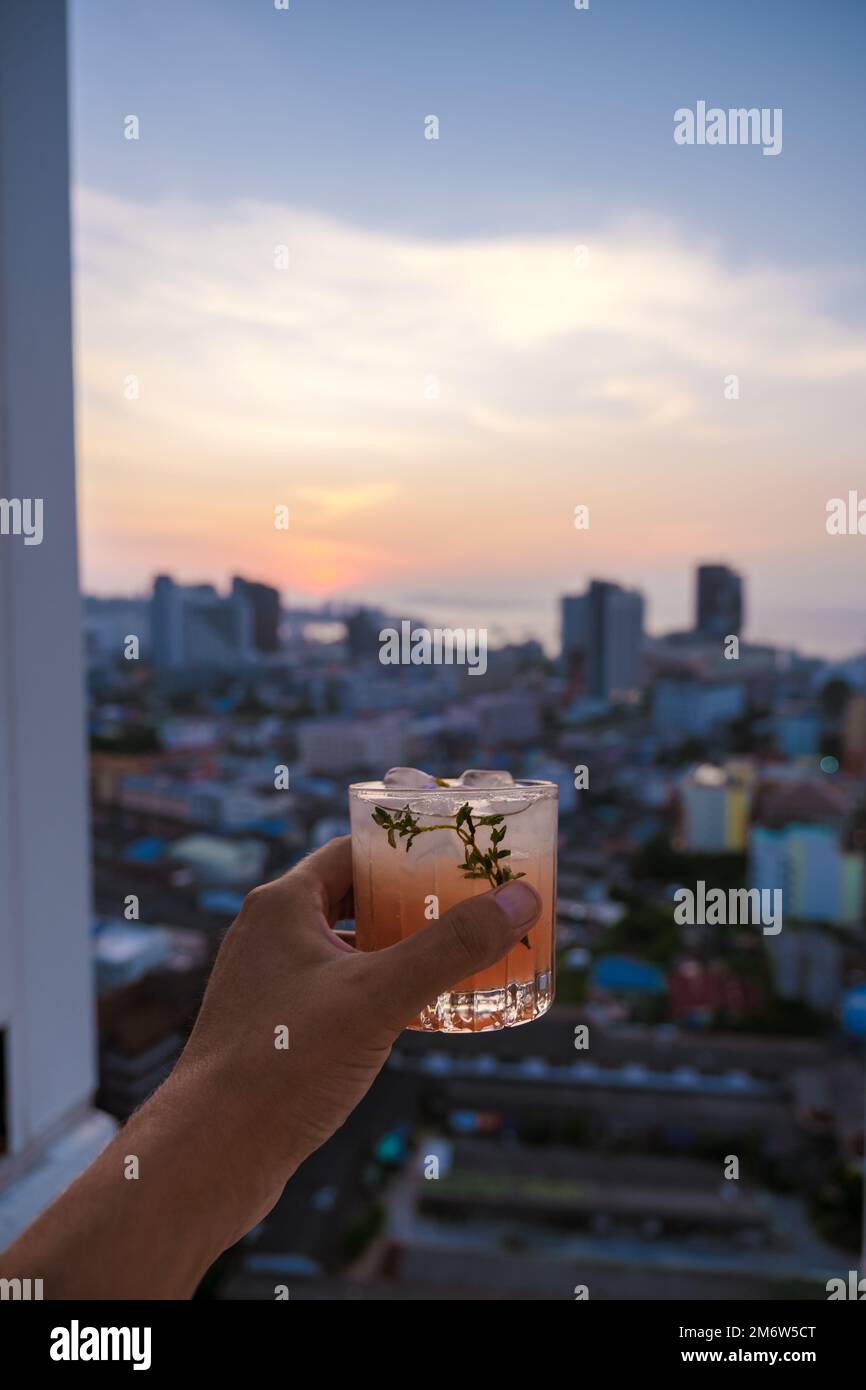 Cocktail drinks on a rooftop bar in Pattaya Thailand Stock Photo - Alamy