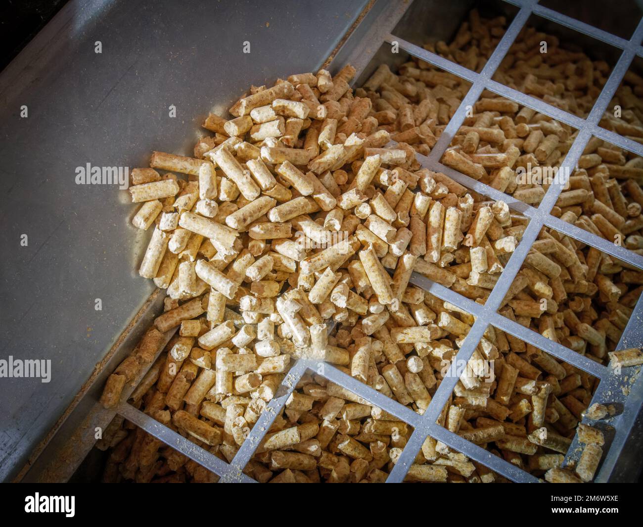 Wooden pellets for home heating Stock Photo - Alamy
