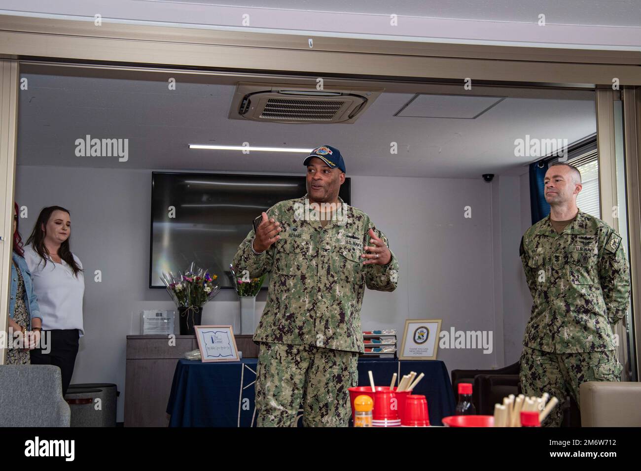 Capt. David Adams, Commander, Fleet Activities Sasebo (CFAS), speaks to ...